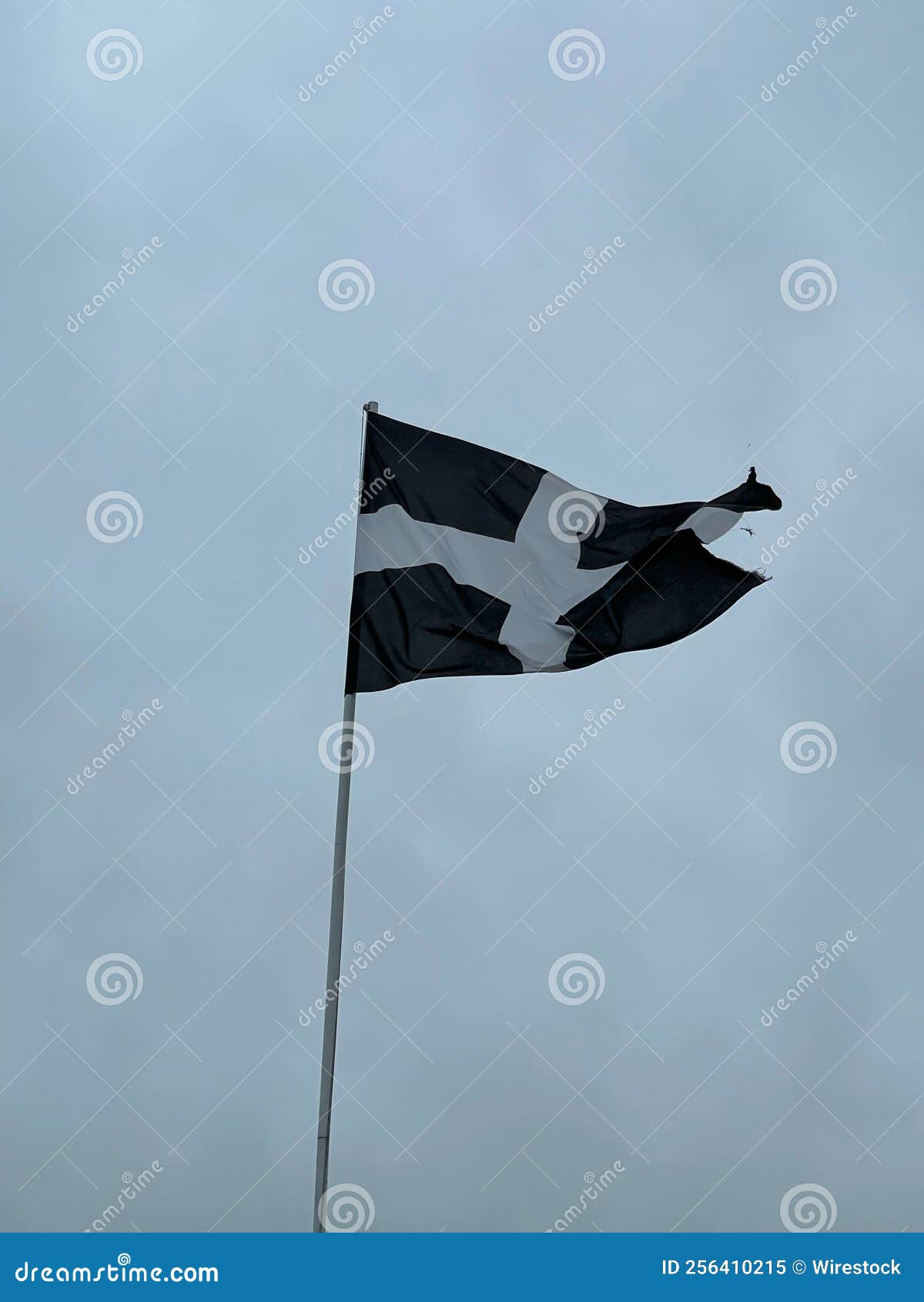 Vertical Shot of the Cornwall Flag Waving in the Sky Stock Image ...
