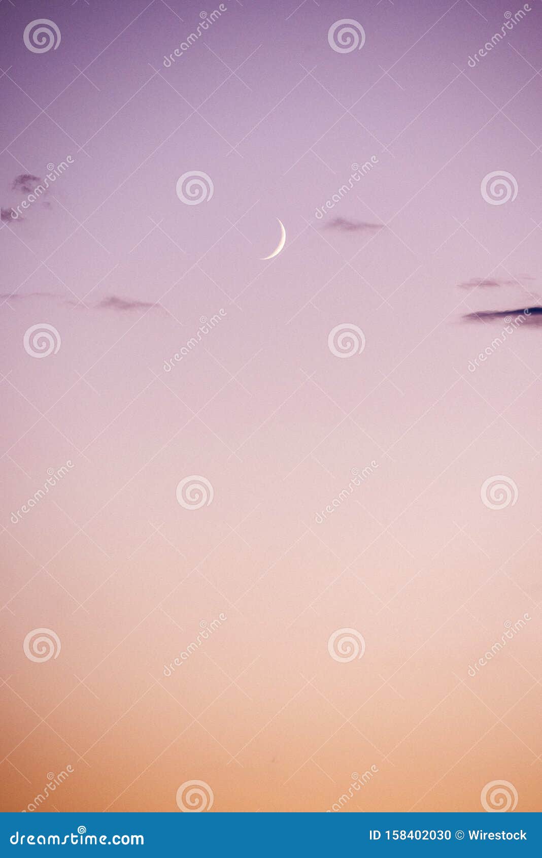 Vertical Shot of the Crescent Moon in the Pink-purple Sky Stock Photo ...