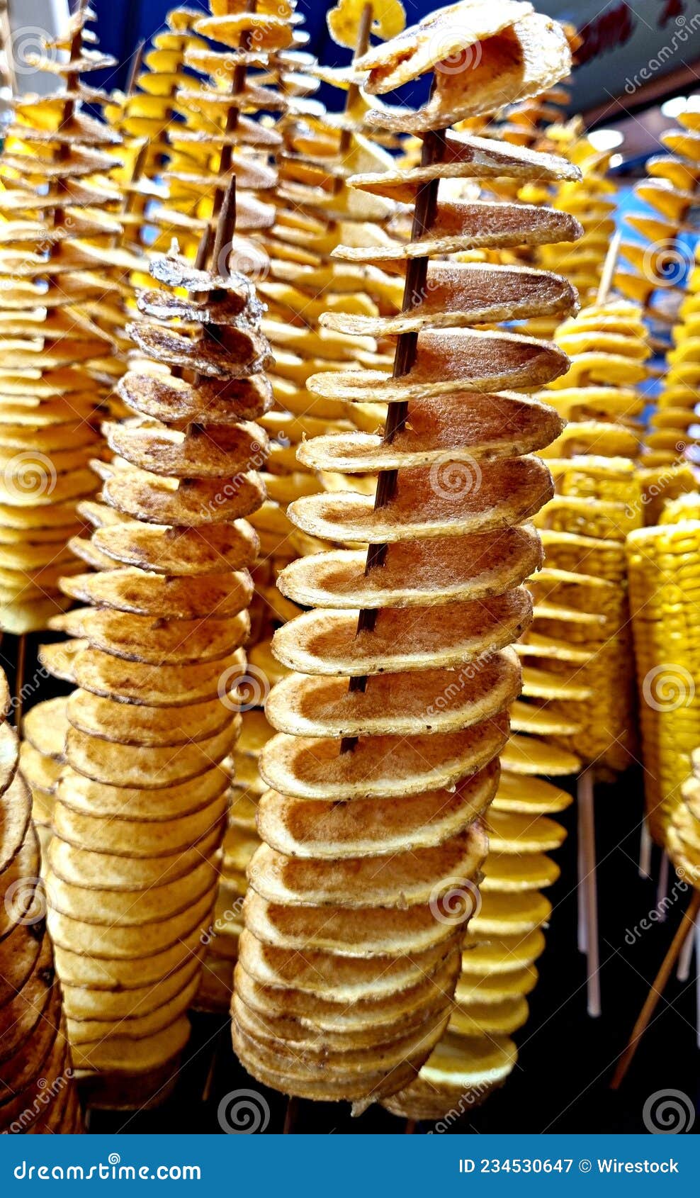 Vertical Shot of Curled Potato Chips on Sticks Stock Image - Image of ...