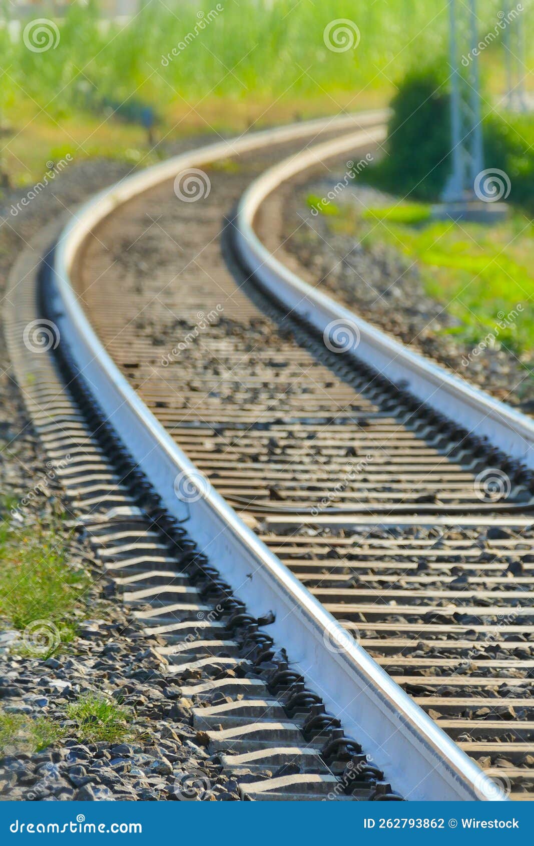 Vertical Shot of a Curve and Narrow Railroad Track Stock Photo - Image ...