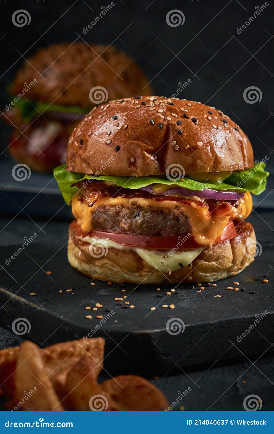 Vertical Shot of a Delicious Burger on a Blackboard Stock Image - Image ...