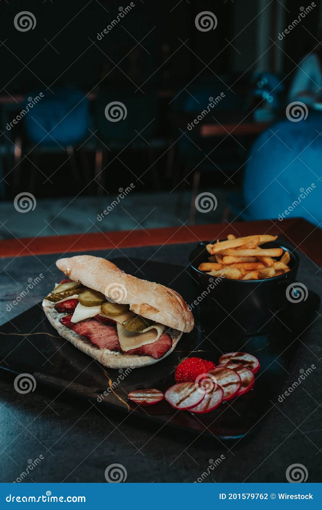 Vertical Shot of a Delicious Sandwich on a Plate Stock Photo - Image of ...