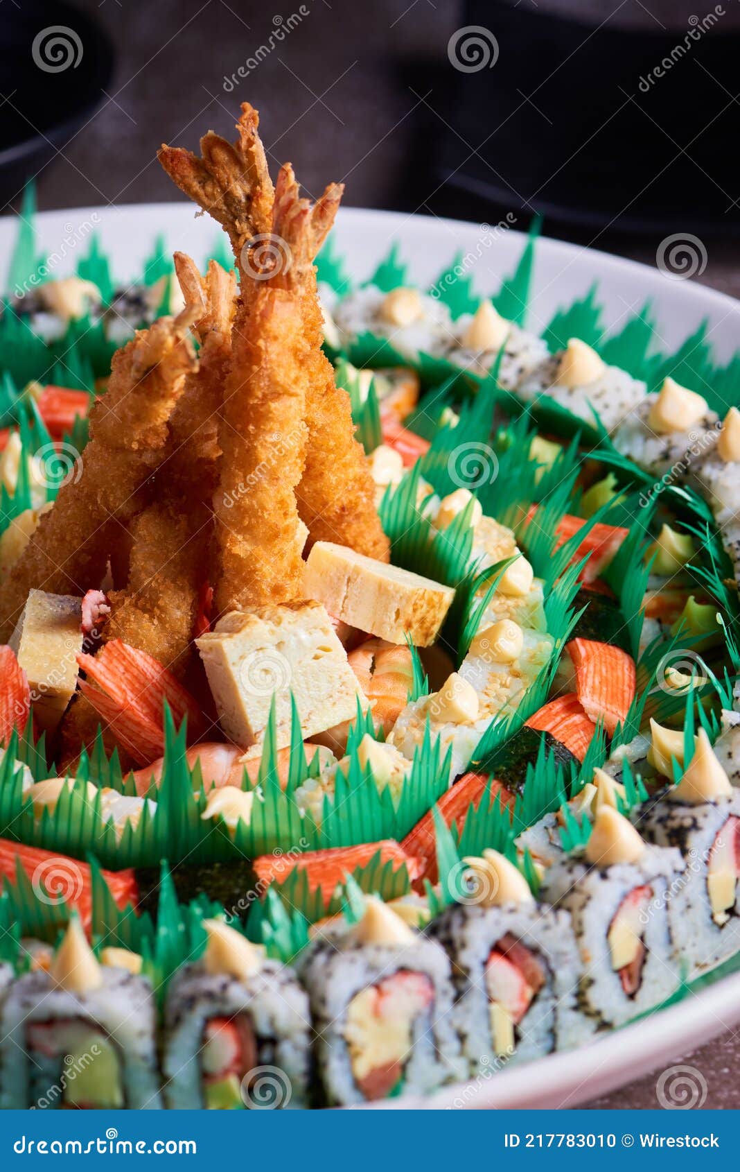 Vertical Shot of Delicious Sushi on a Decorated Plate Stock Photo ...