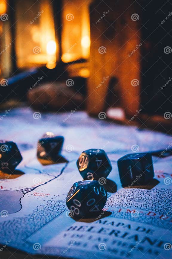 Vertical Shot of Dice on a Map with an Old Lamp Blurred in the ...