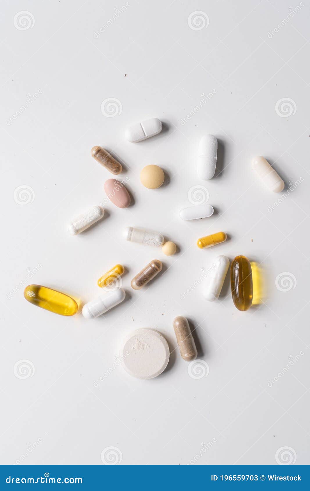 Vertical Shot of Different Pills and Capsules on a White Surface Stock ...