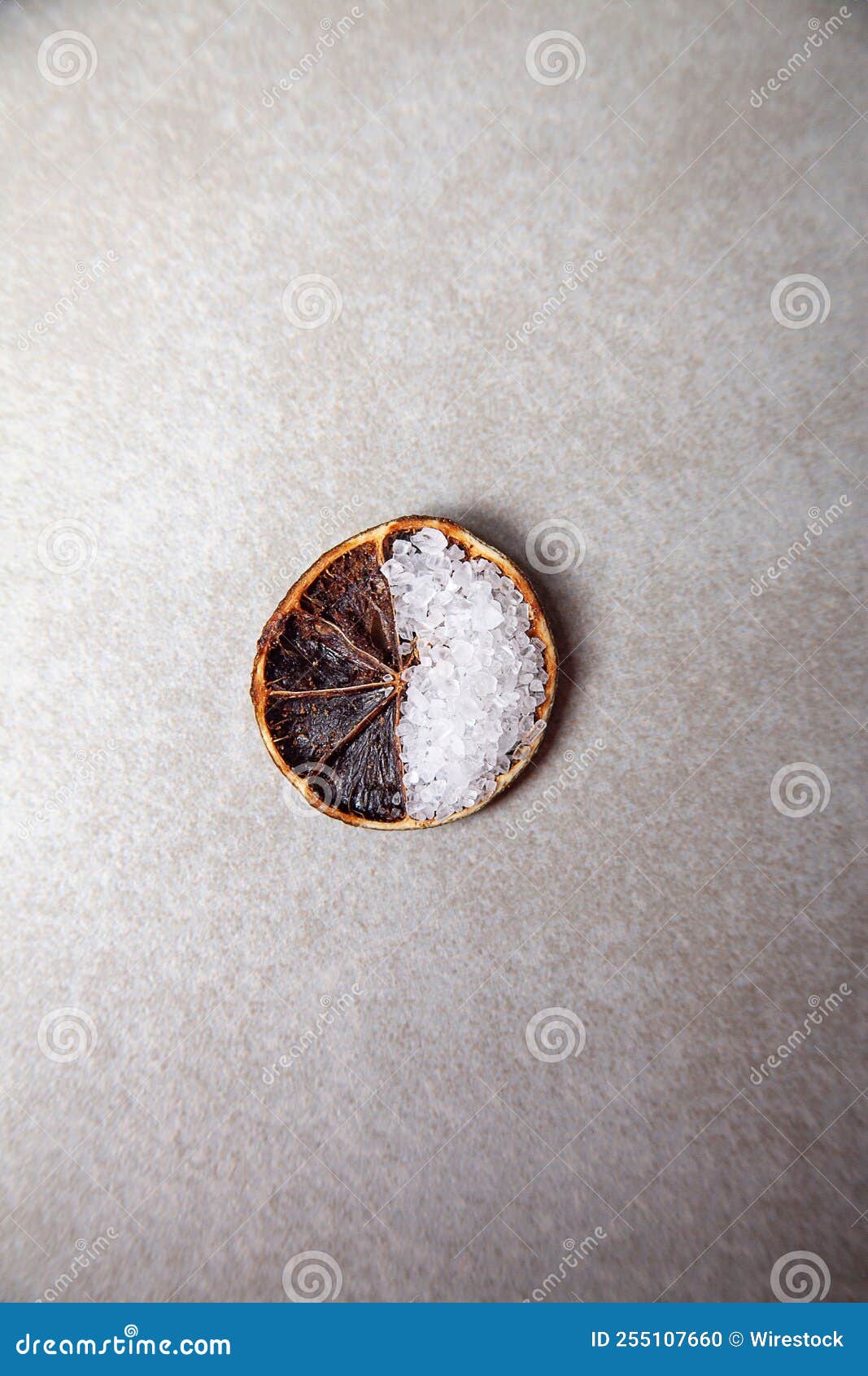 Vertical Shot of a Dried Orange Slice with Salt Stock Photo - Image of ...