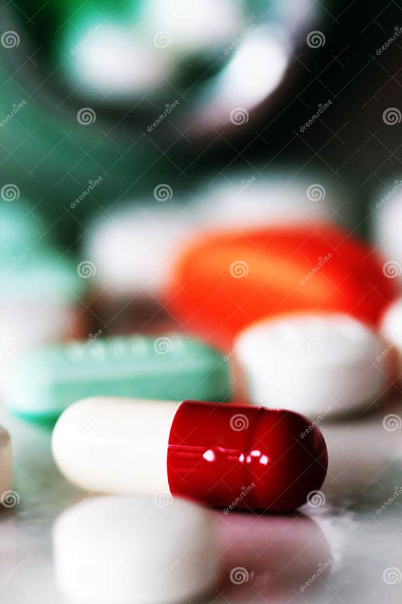 Vertical Shot of a Drug Pill on a Table Stock Image - Image of ...