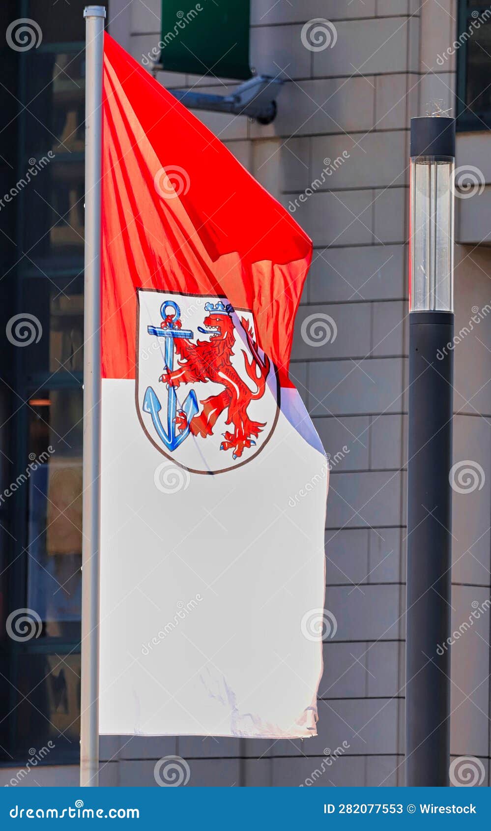 Vertical Shot of the Duesseldorf Municipal Code of Arms on a Flag Stock ...