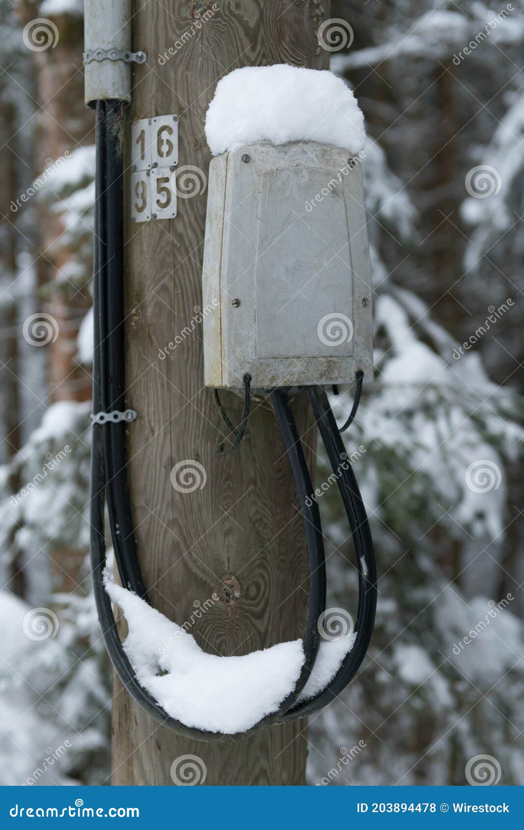 Vertical Shot of Electric Meter on the Pole during Winter Stock Photo ...