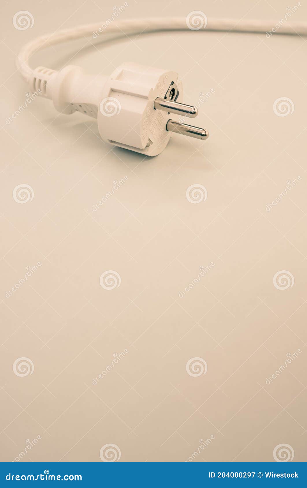 Vertical Shot of an Electrical Plug and Wire on a White Surface Stock ...