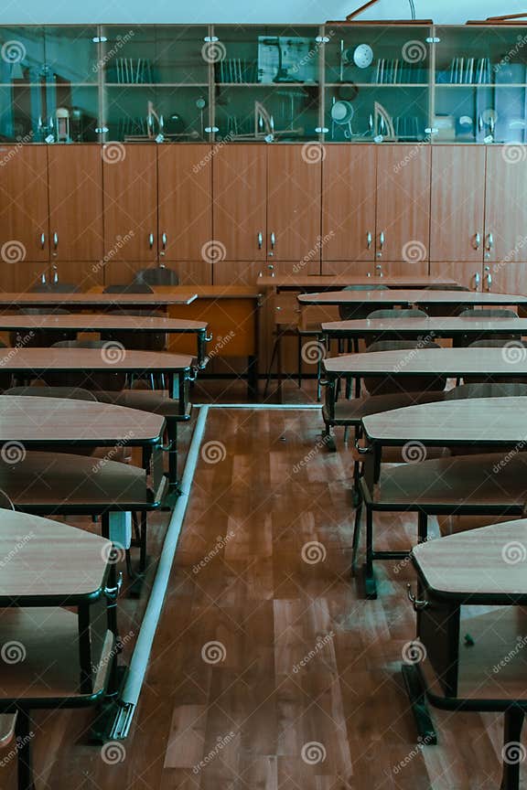 Vertical Shot in an Empty Classroom Full of Desks Stock Photo - Image ...
