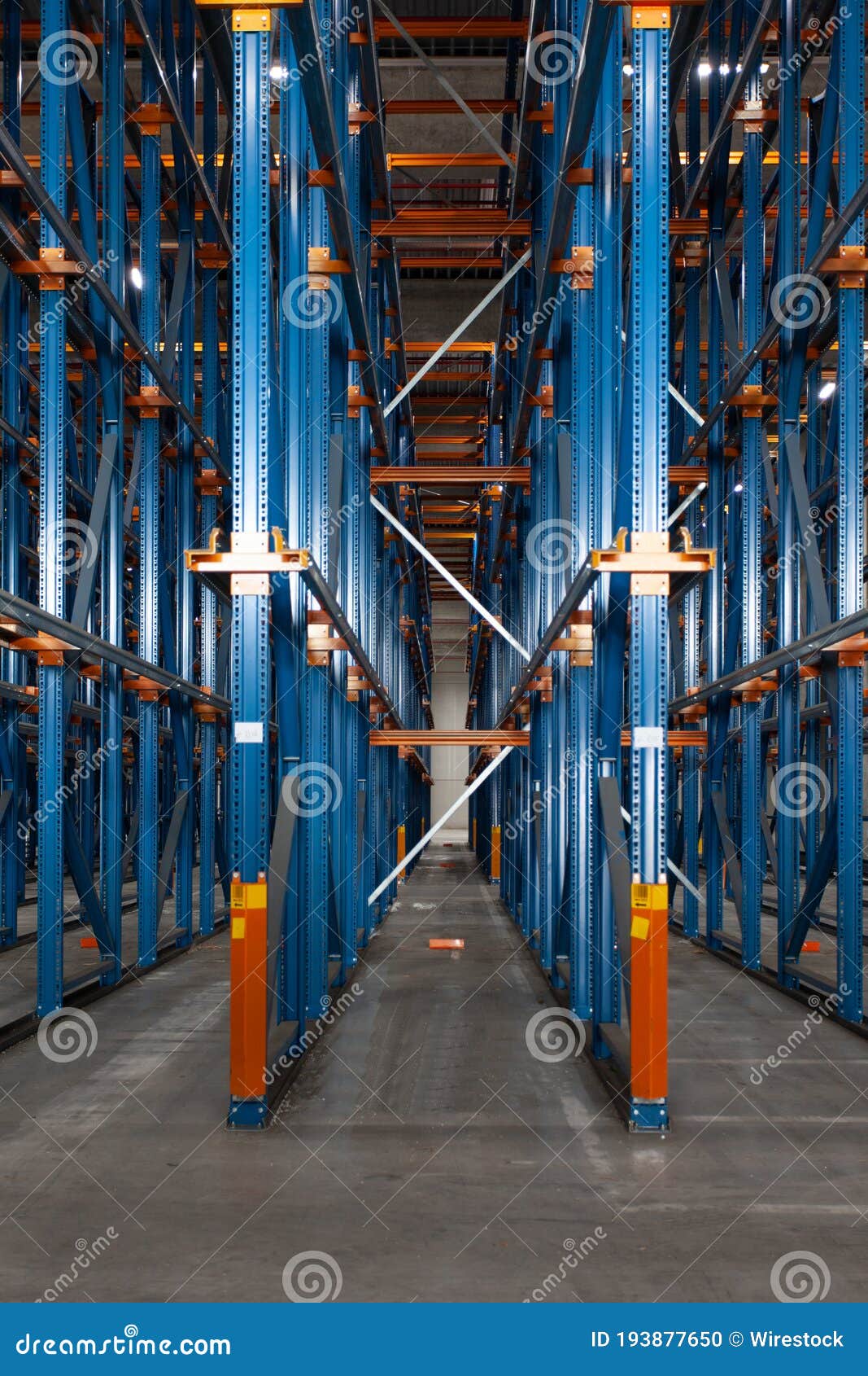Vertical Shot of Empty Storage Racks in a Warehouse Stock Photo - Image ...