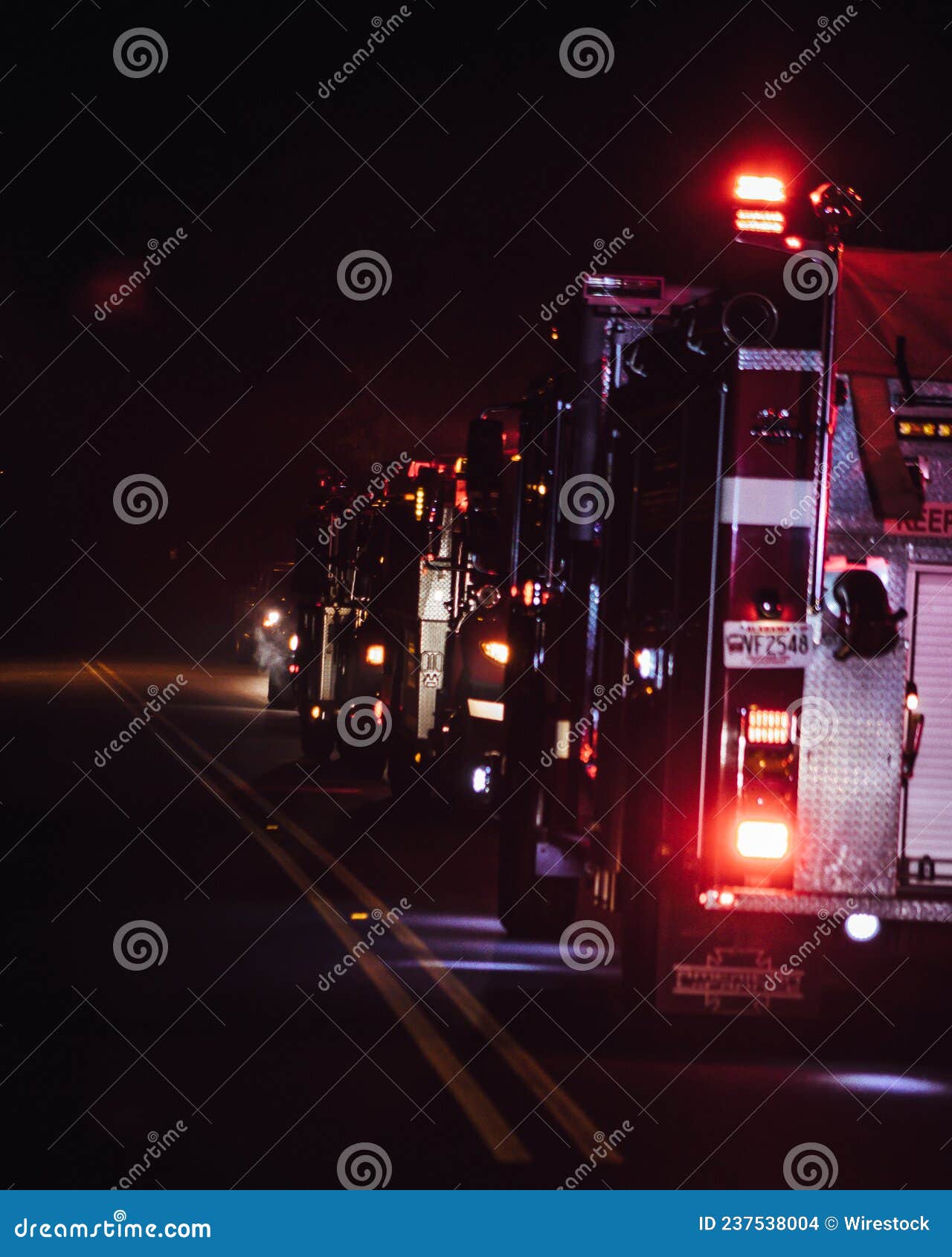 Vertical Shot of Fire Engines at Night Editorial Stock Image - Image of ...