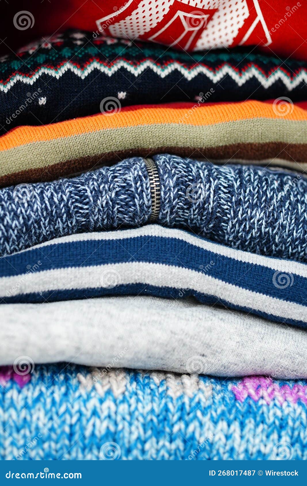 Vertical Shot of Folded Sweaters Stacked on Each Other Stock Image ...
