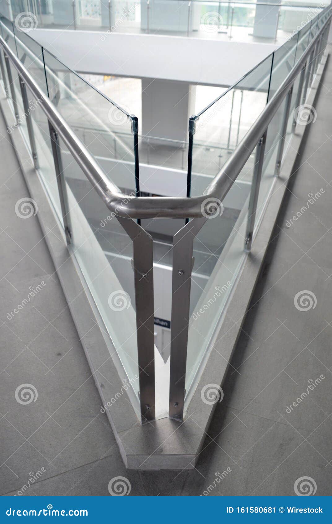 Vertical Shot of Glass Surfaces Forming a Sharp Angle in a Modern ...