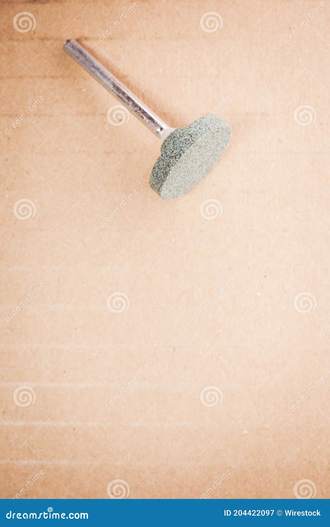 Vertical Shot of a Grinding Disc on a Paperboard Surface Stock Image ...