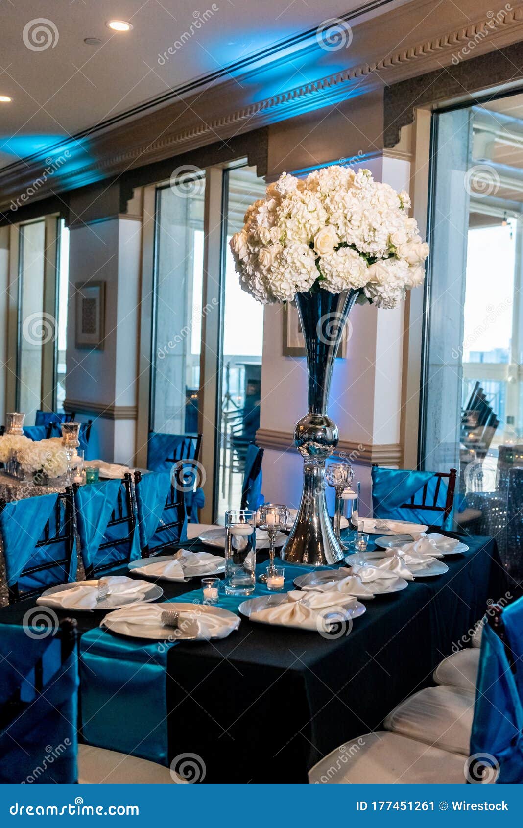 Vertical Shot of a Hall with an Elegant Table Setting in Blue and White ...