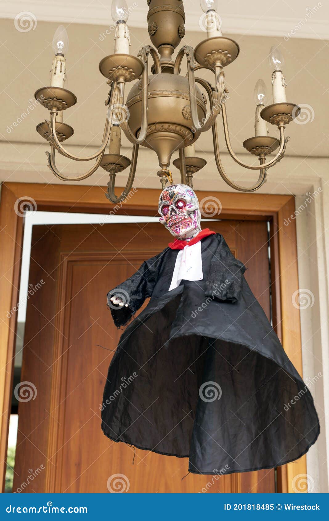 Vertical Shot of a Halloween Skull Monster Hanging Outdoors Stock Image ...