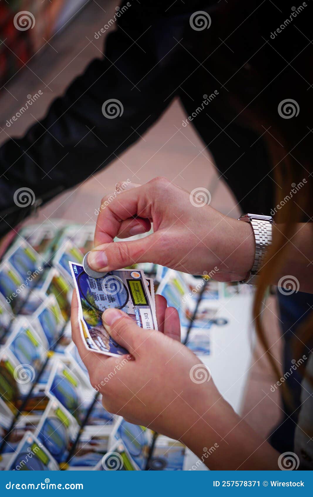Vertical Shot of Hands Holding Scratch Game Stock Image - Image of card ...