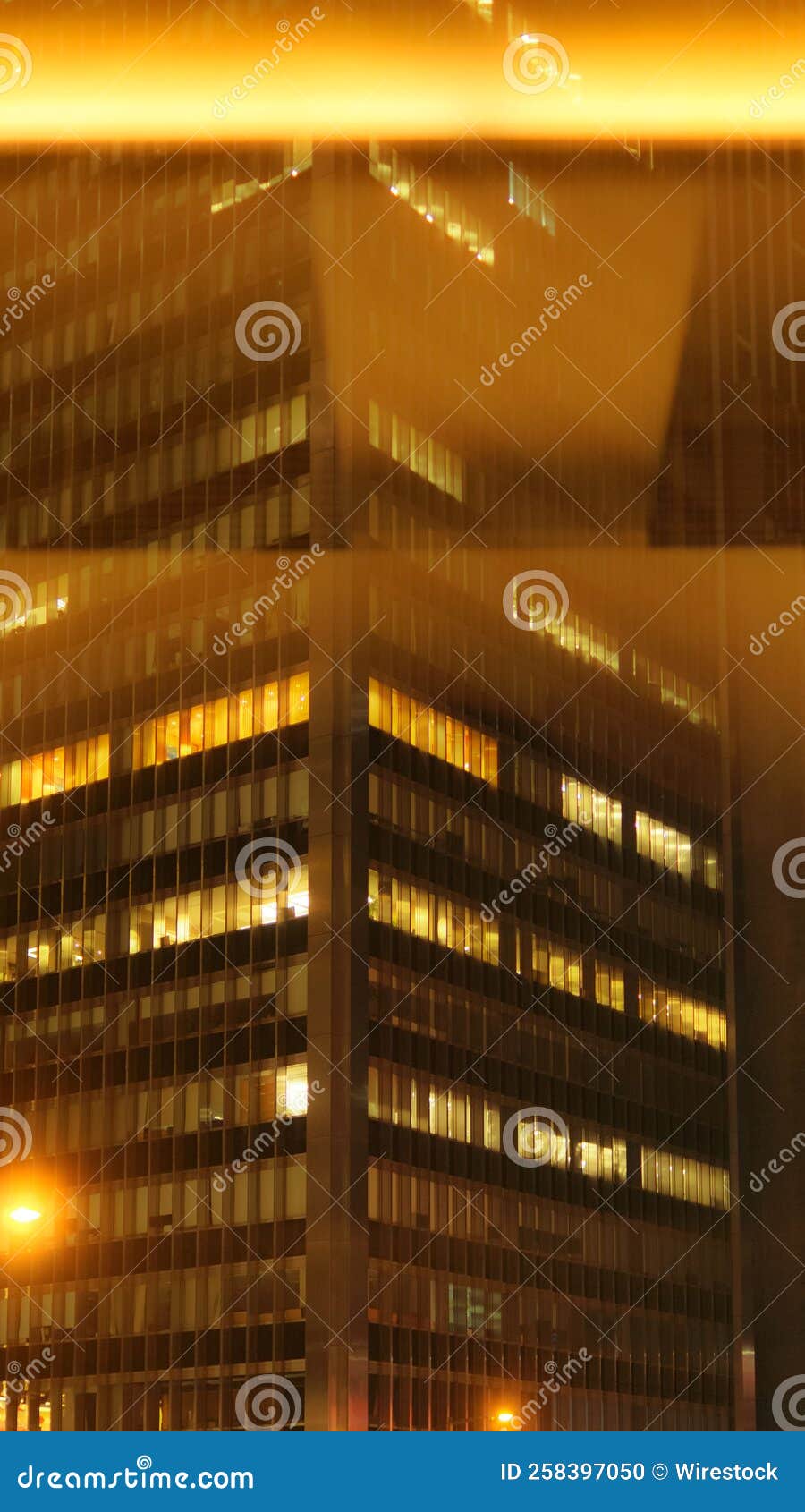 Vertical Shot of High-rise Building at Night Stock Photo - Image of ...