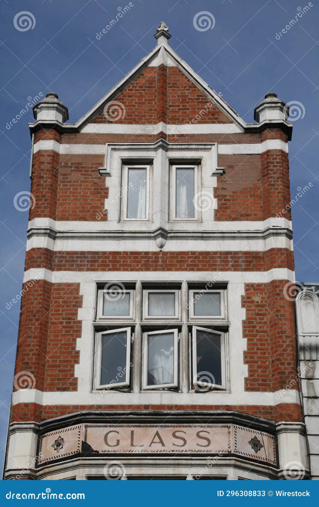 Vertical Shot of a Historic Brick Tower with Windows in London ...
