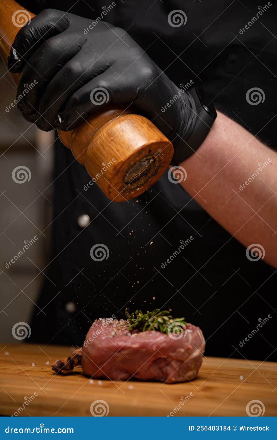 Vertical Shot of Human Hand Marinating Steak on Board Stock Photo ...