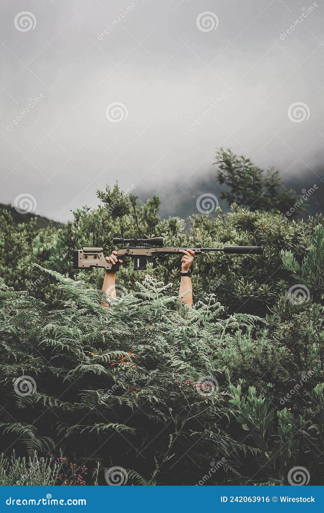 Vertical Shot of a Hunter Keeps a Gun in a Forest Stock Photo - Image ...