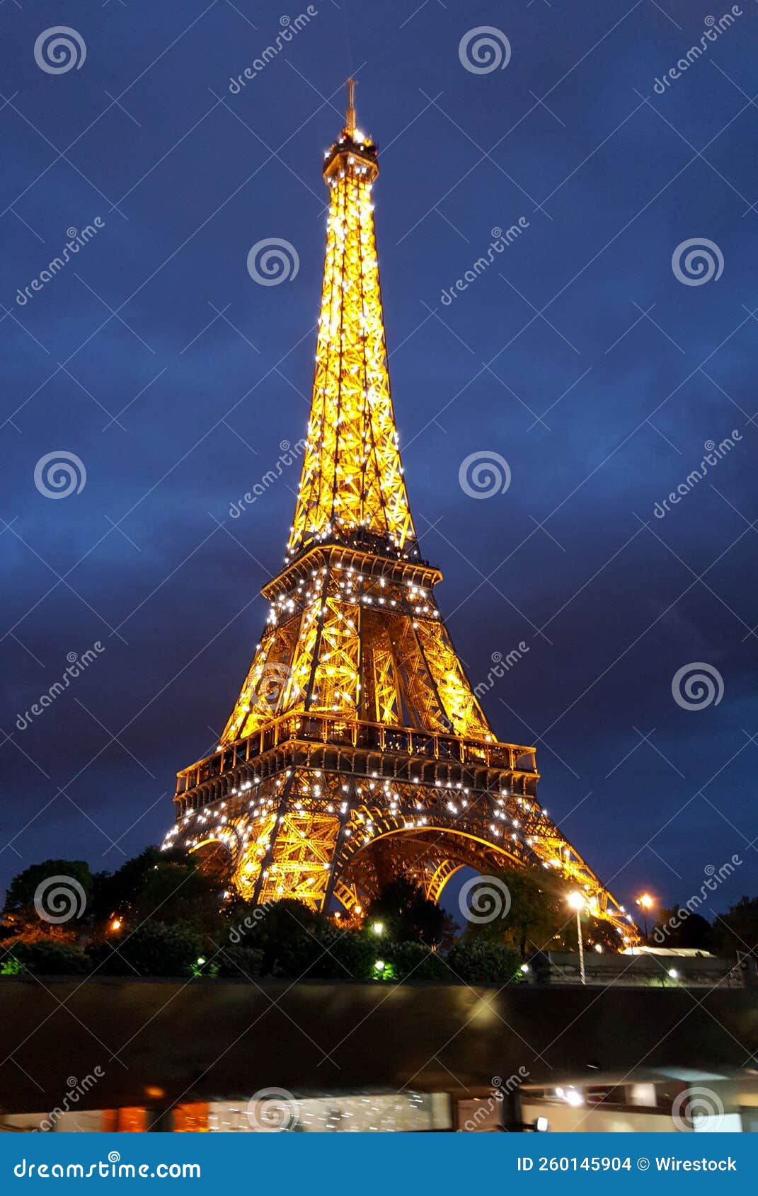 Vertical Shot of the Illuminated Eiffel Tower Editorial Stock Image ... Vertical Shot of the Illuminated Eiffel Tower Editorial Stock Image ...