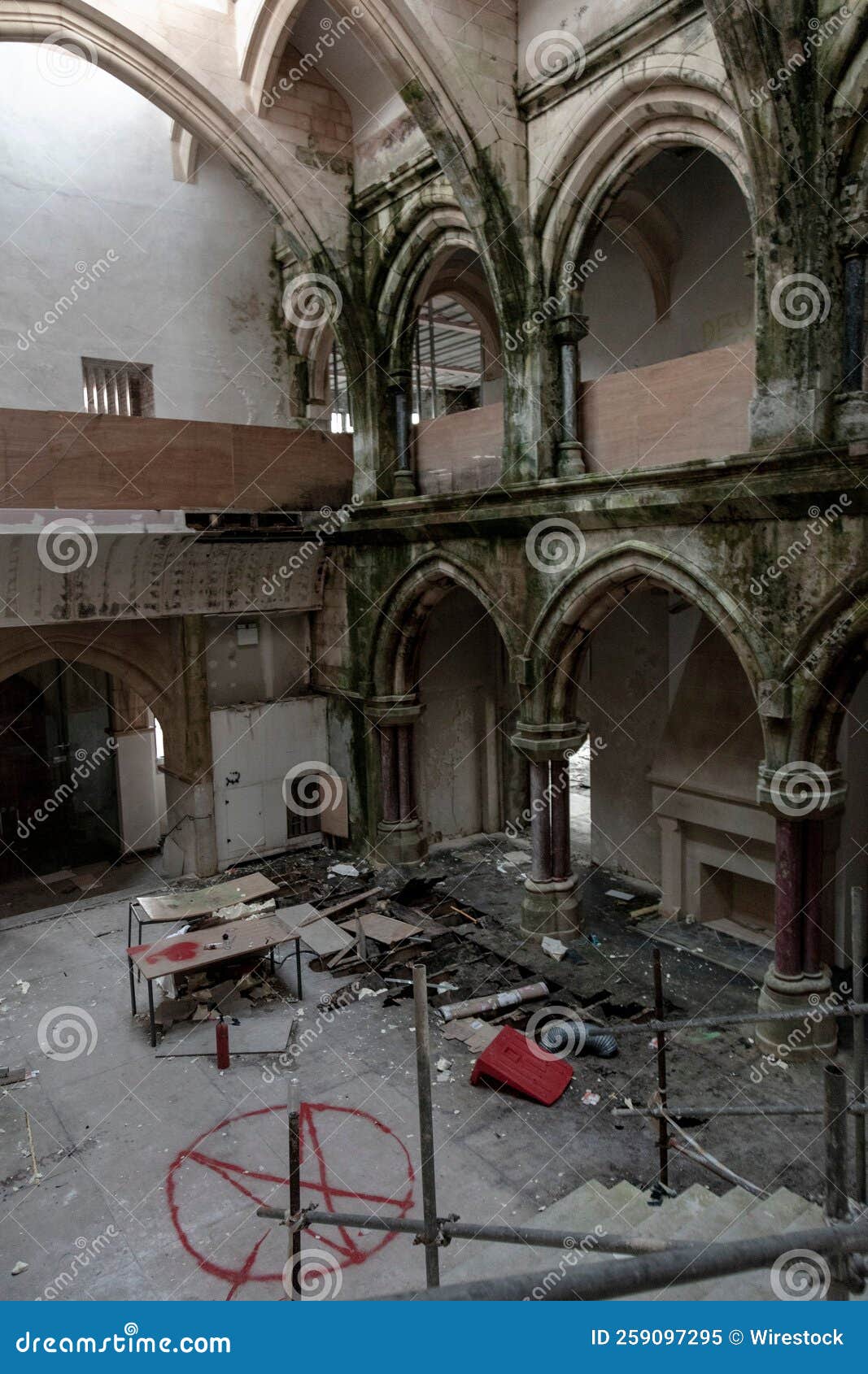 Vertical Shot of the Inside of an Abandoned Cathedral with Arches and a ...