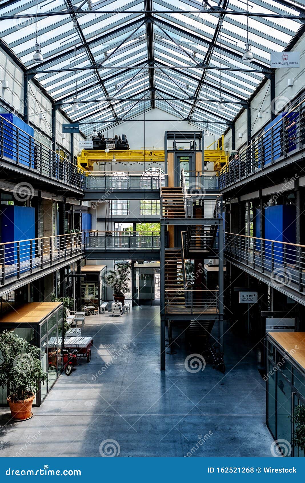 Vertical Shot of the Inside of an Engineering Office with Multiple ...
