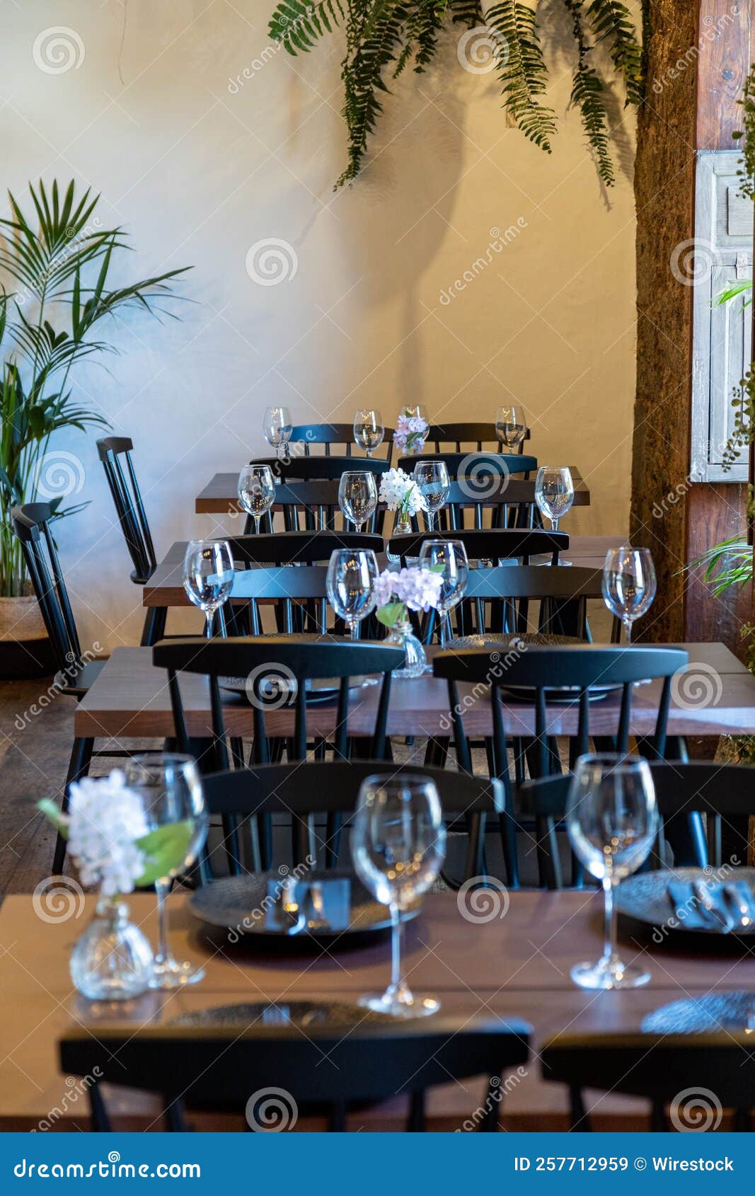 Vertical Shot of the Interior of a Restaurant with Tables Ready To Be ...