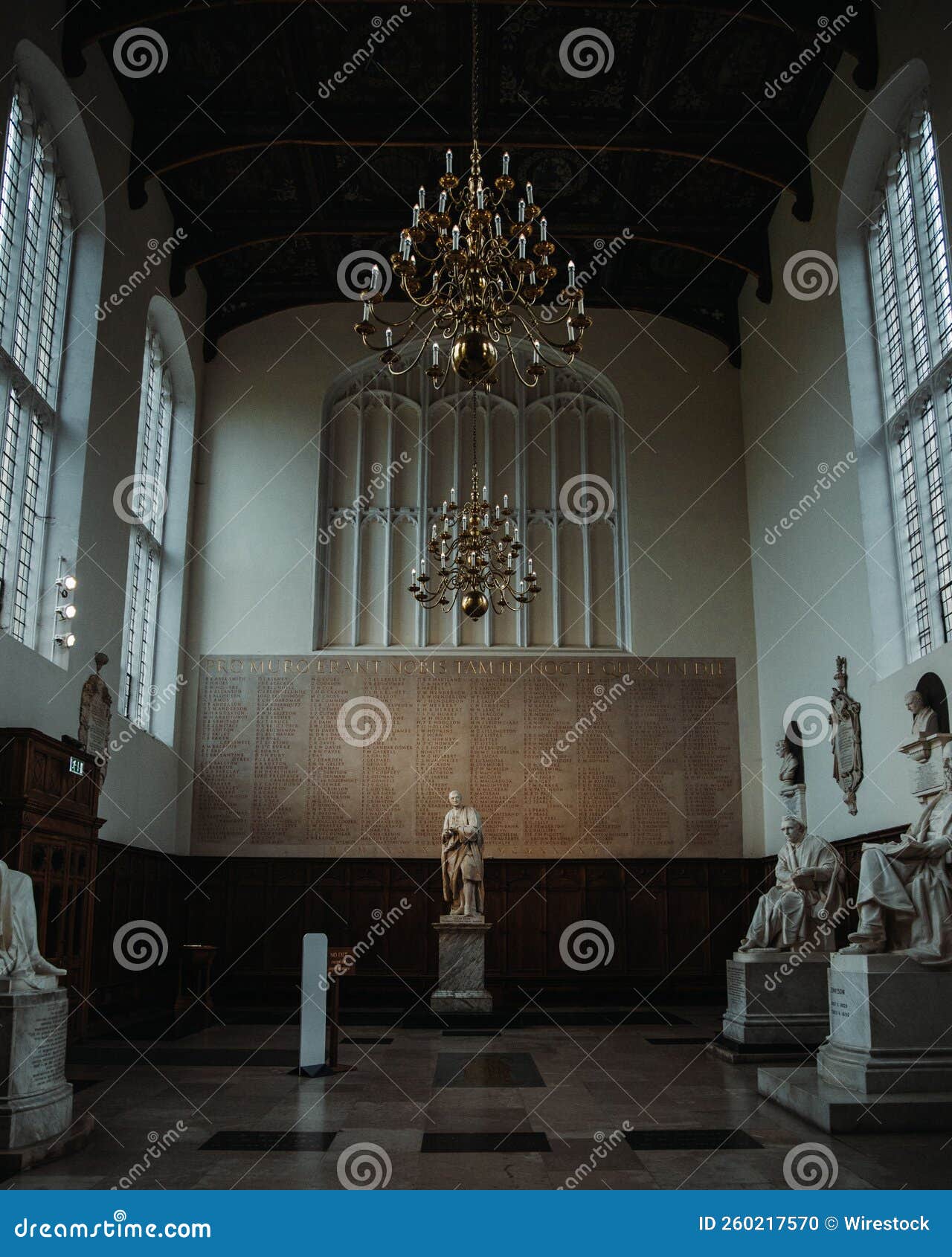 Vertical Shot of the Interior of the Trinity College with Statues in ...
