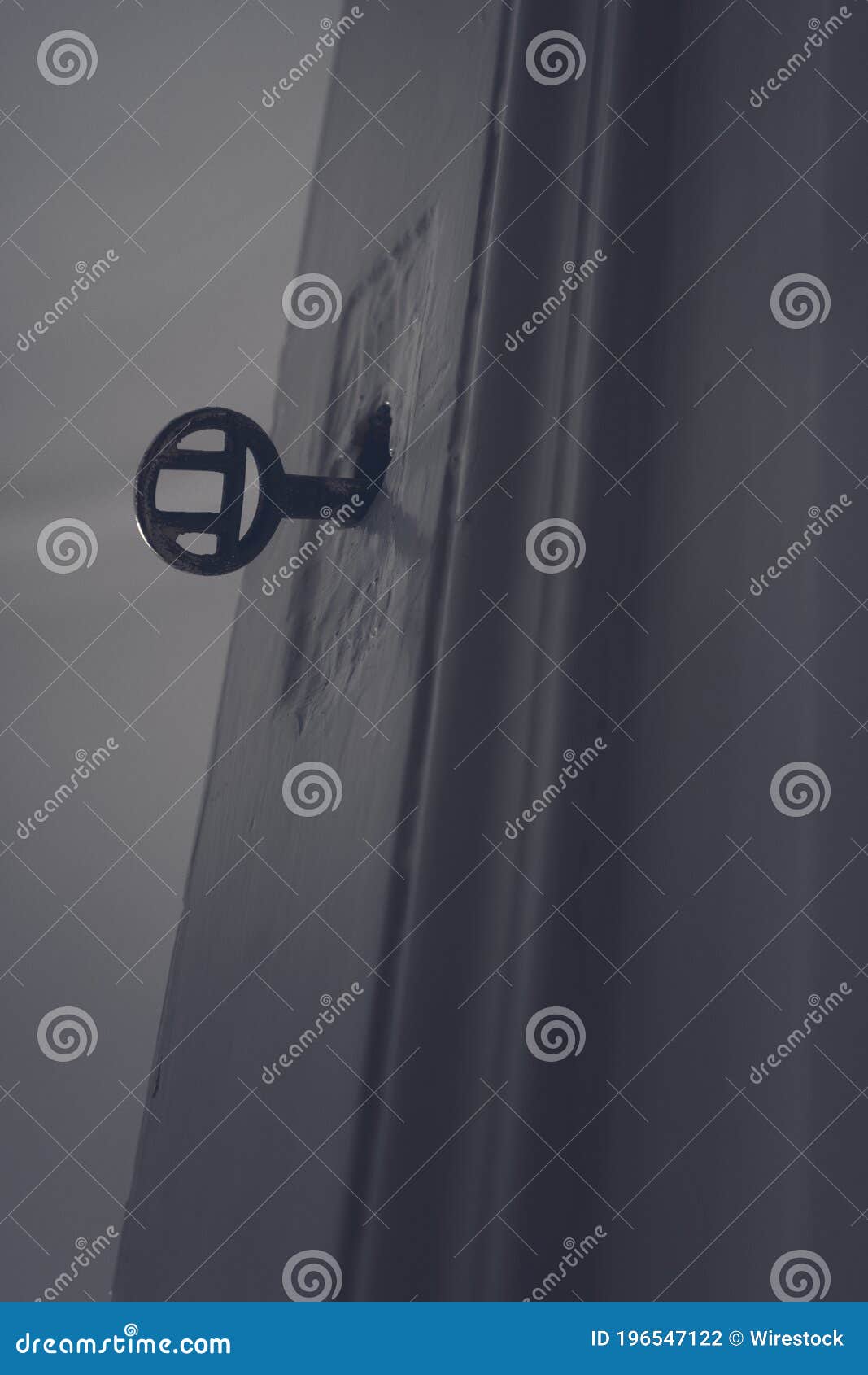 Vertical Shot of a Key in the Lock Stock Photo - Image of safety, iron ...
