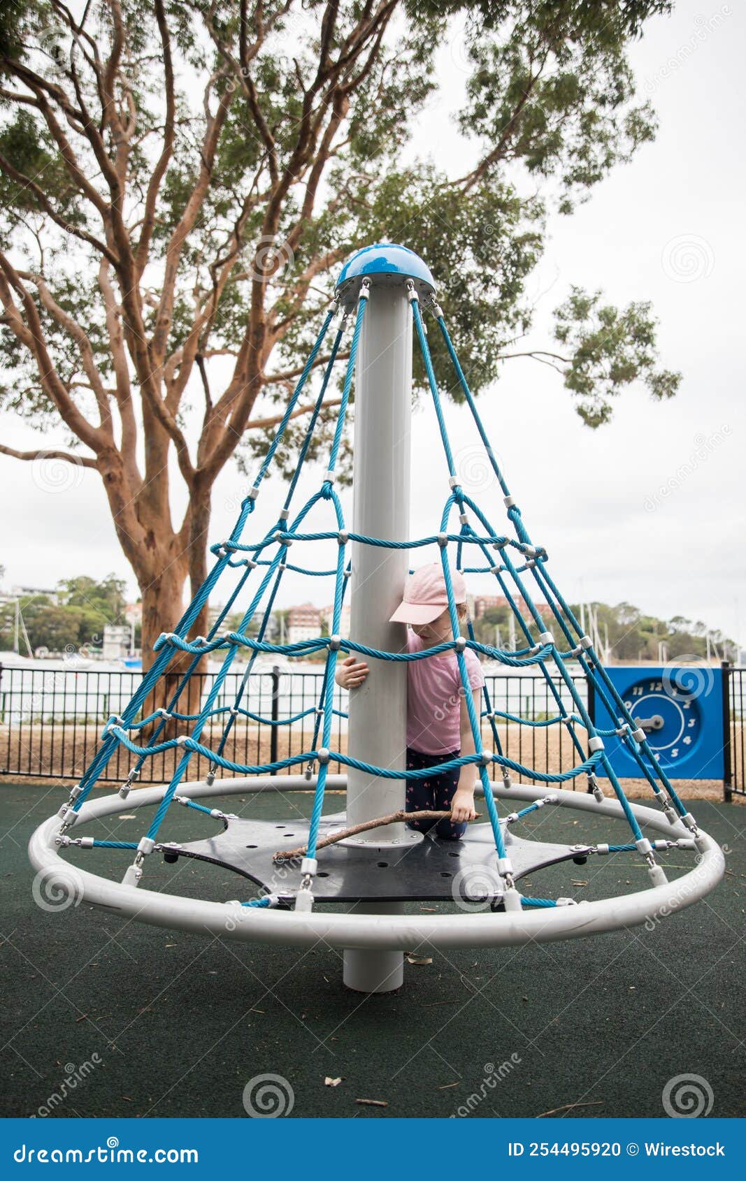 Vertical Shot of a Kid Playing on the Playground Stock Photo - Image of ...