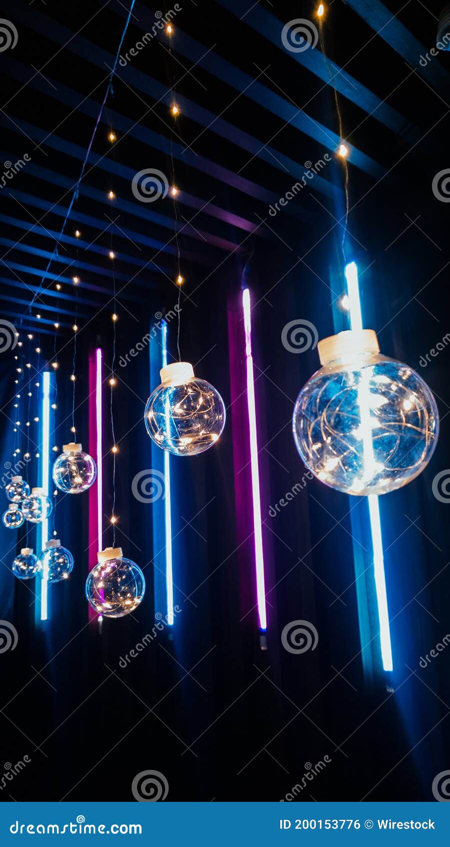 Vertical Shot of Light Bulbs and Led Lights Hanging from the Ceiling ...