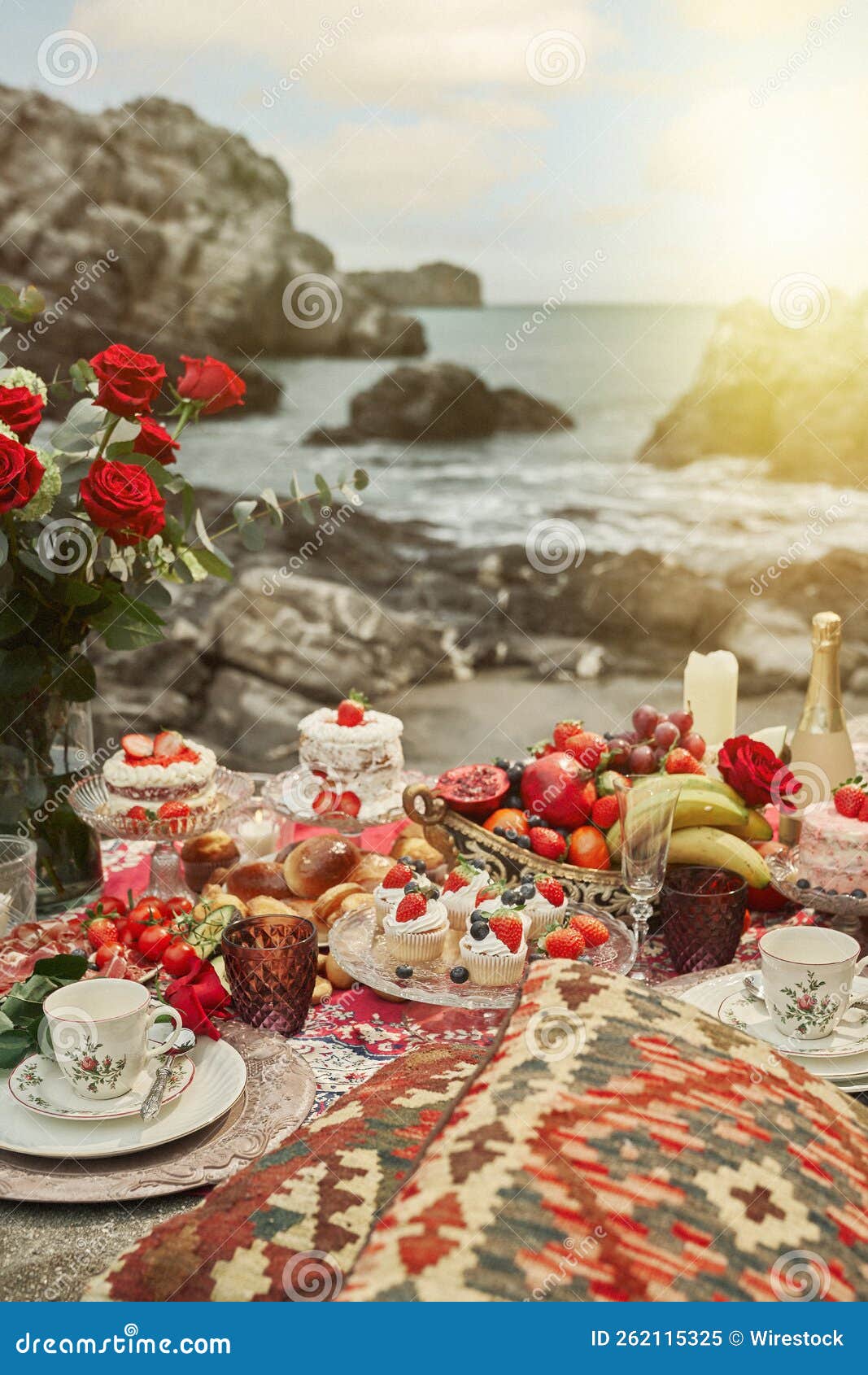 Vertical Shot of a Luxurious Romantic Picnic on a Seashore Stock Image ...