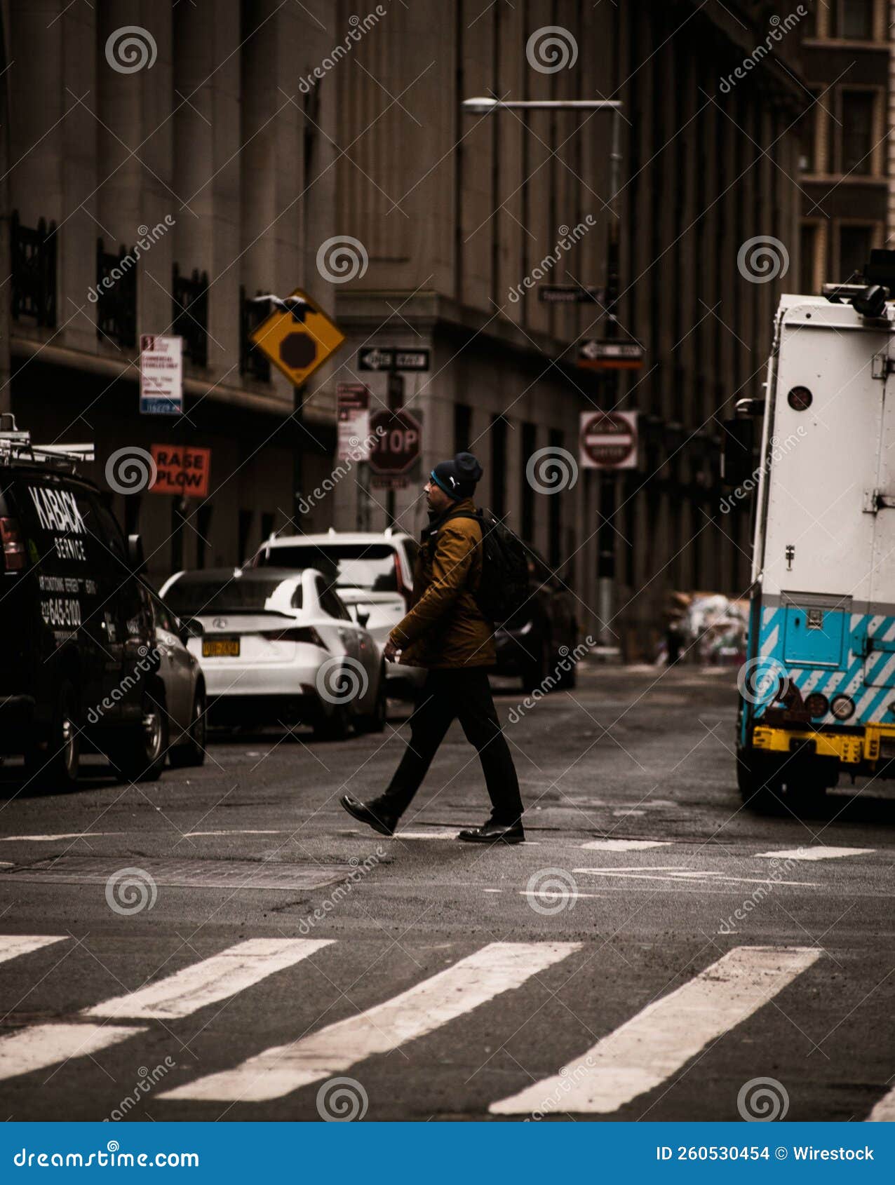 Vertical Shot of a Man Crossing the Street at Crosswalk Editorial Stock ... Vertical Shot of a Man Crossing the Street at Crosswalk Editorial Stock ...