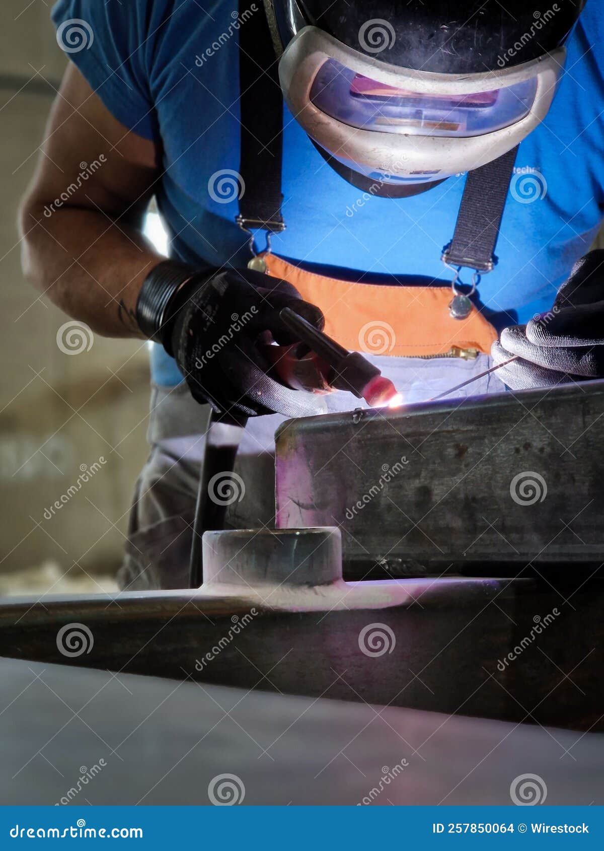 Vertical Shot of a Man during the Welding Process in His Workshop Stock ...