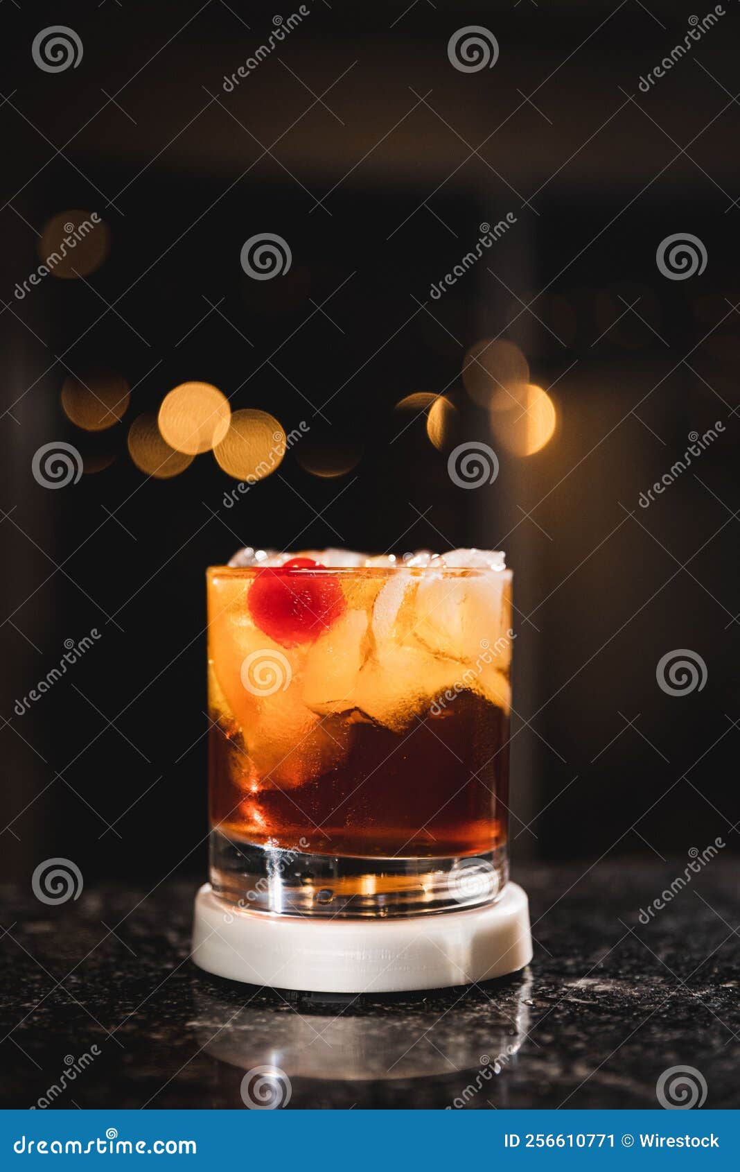 Vertical Shot of a Manhattan Drink Reflected on a Dark Surface Stock ...