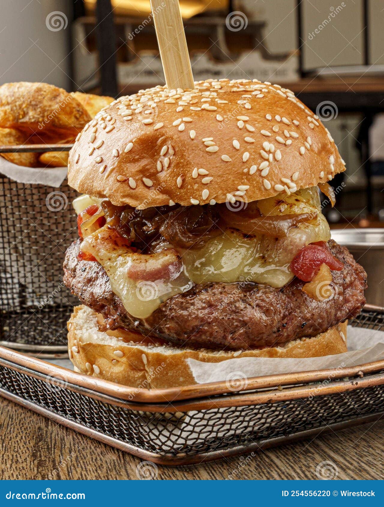 Vertical Shot of a Meat Hamburger with Wedge Potatoes Stock Photo ...