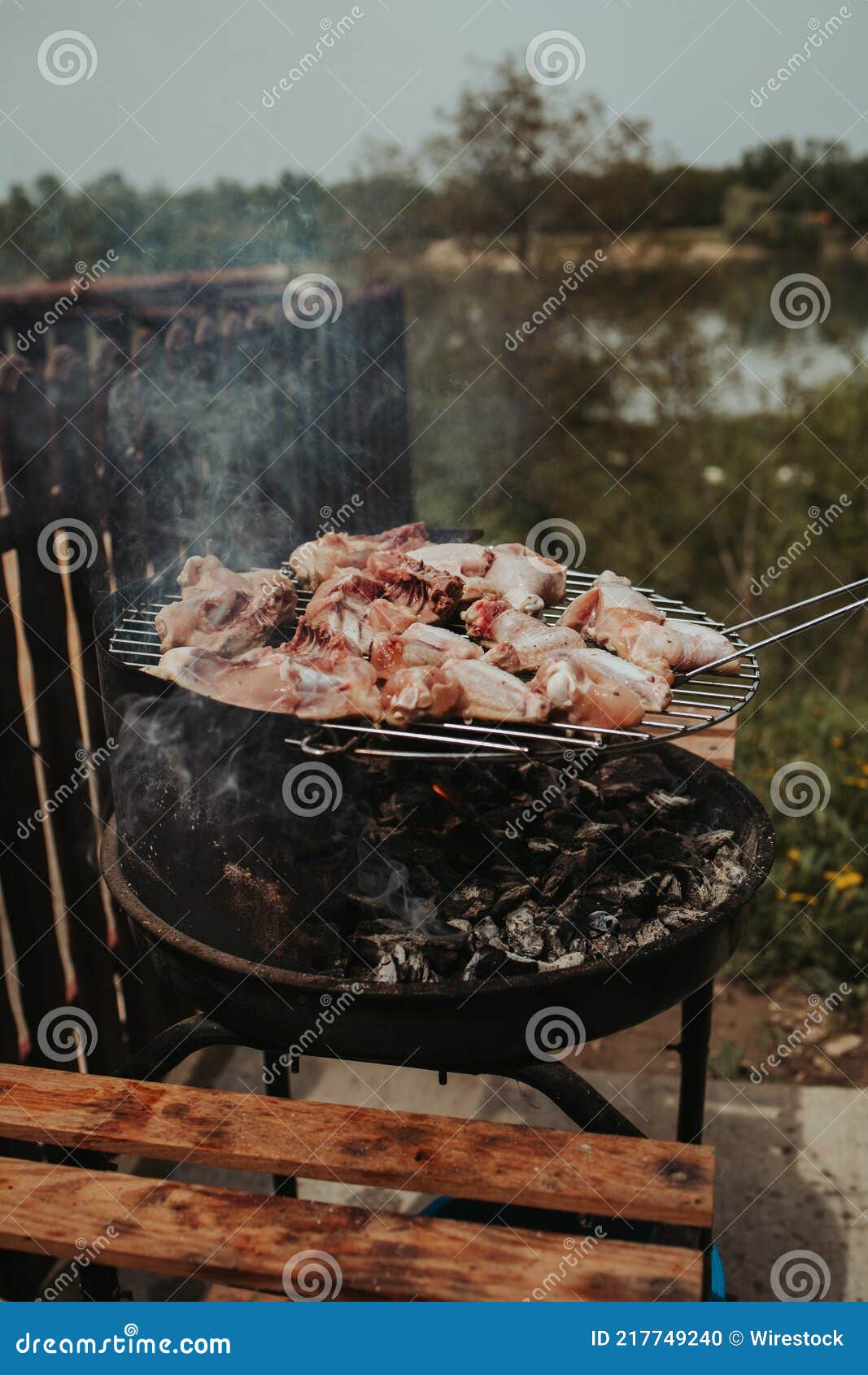 Vertical Shot of Meat Roasting on a Charcoal Grill Stock Photo - Image ...