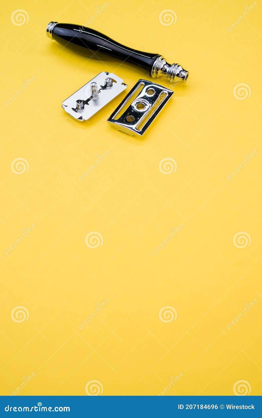 Vertical Shot of a Mechanical Razor and Blade Isolated on Yellow ...