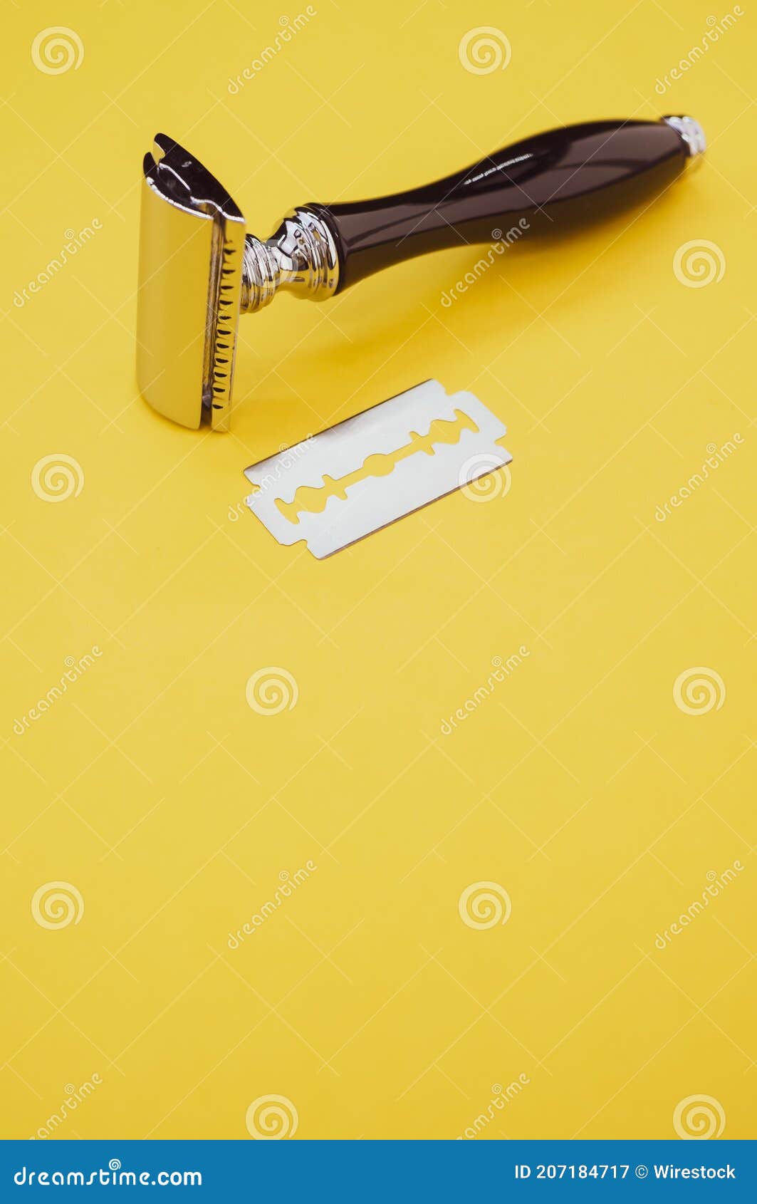 Vertical Shot of a Mechanical Razor and Blade Isolated on Yellow ...