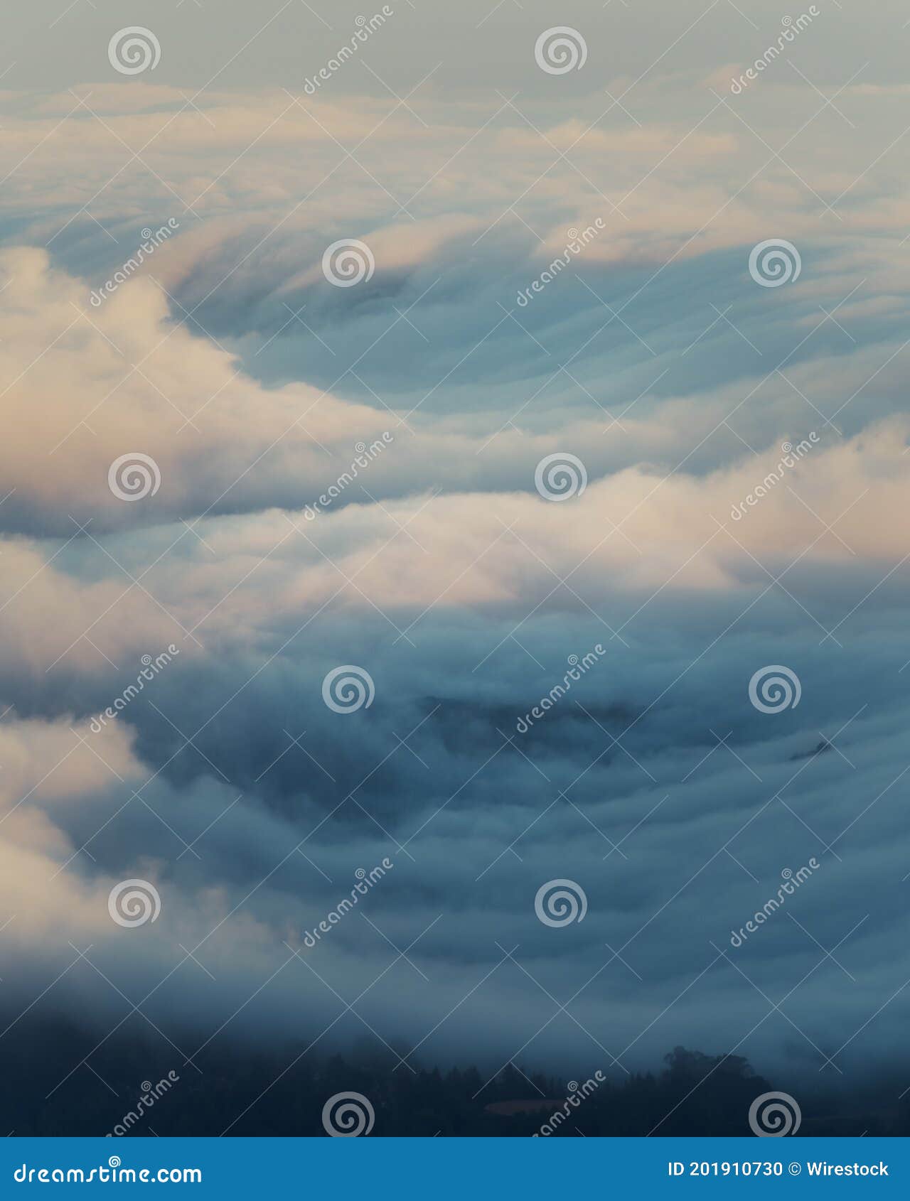 Vertical Shot of a Mesmerizing Cloudscape Stock Photo - Image of mist ...