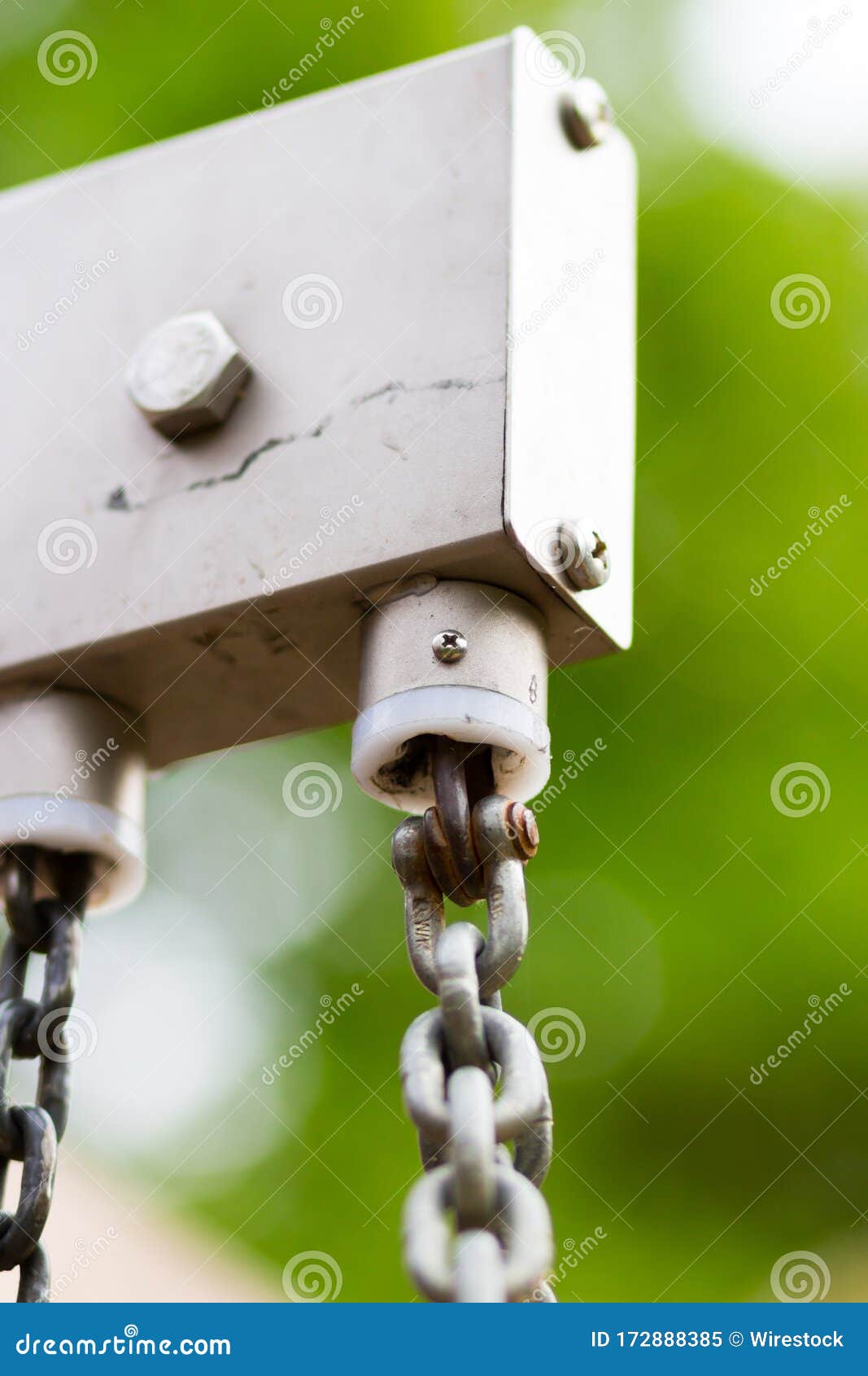 Vertical Shot of a Metal Tool with Chains Hanging from it Stock Image ...