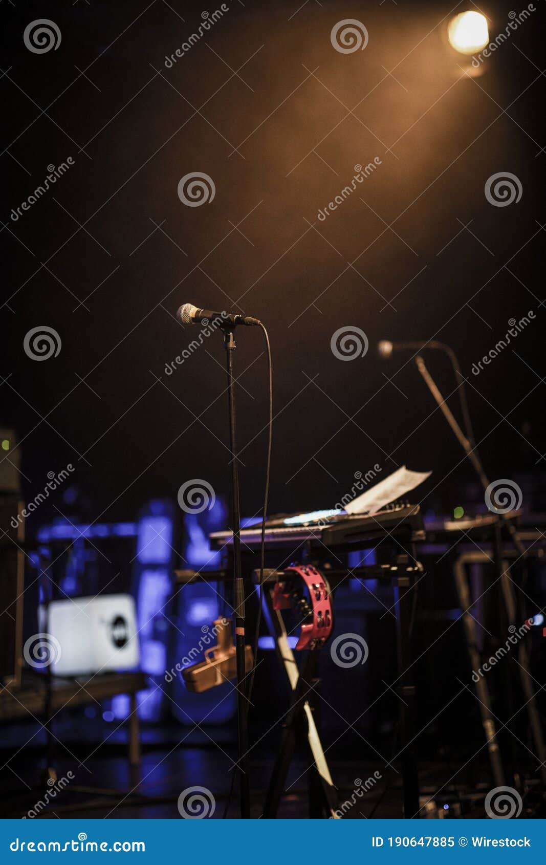 Vertical Shot of a Microphone and Keyboards on the Stage Stock Image ...