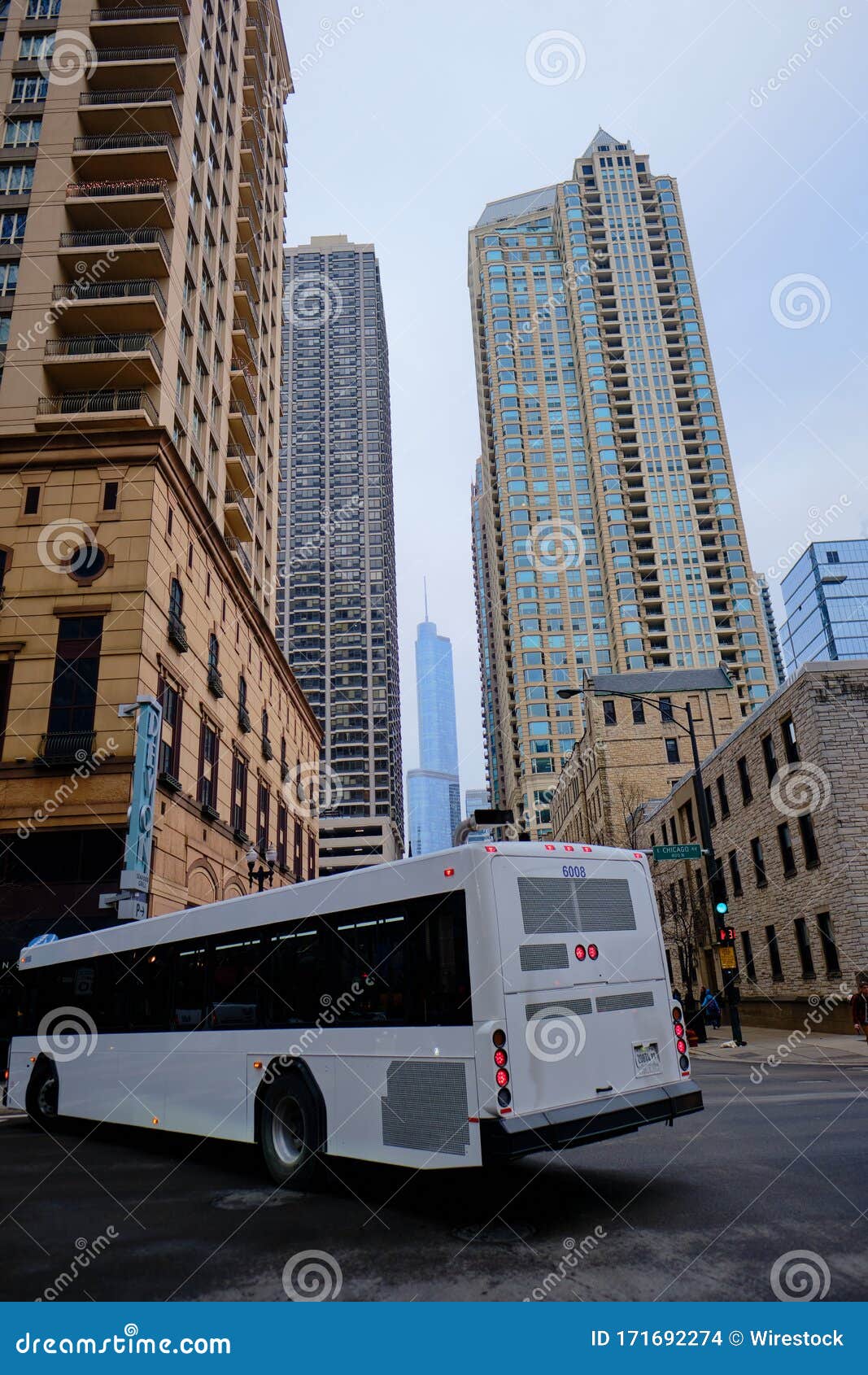 Vertical Shot of Modern Skyscrapers and a White Bus Editorial Stock ...