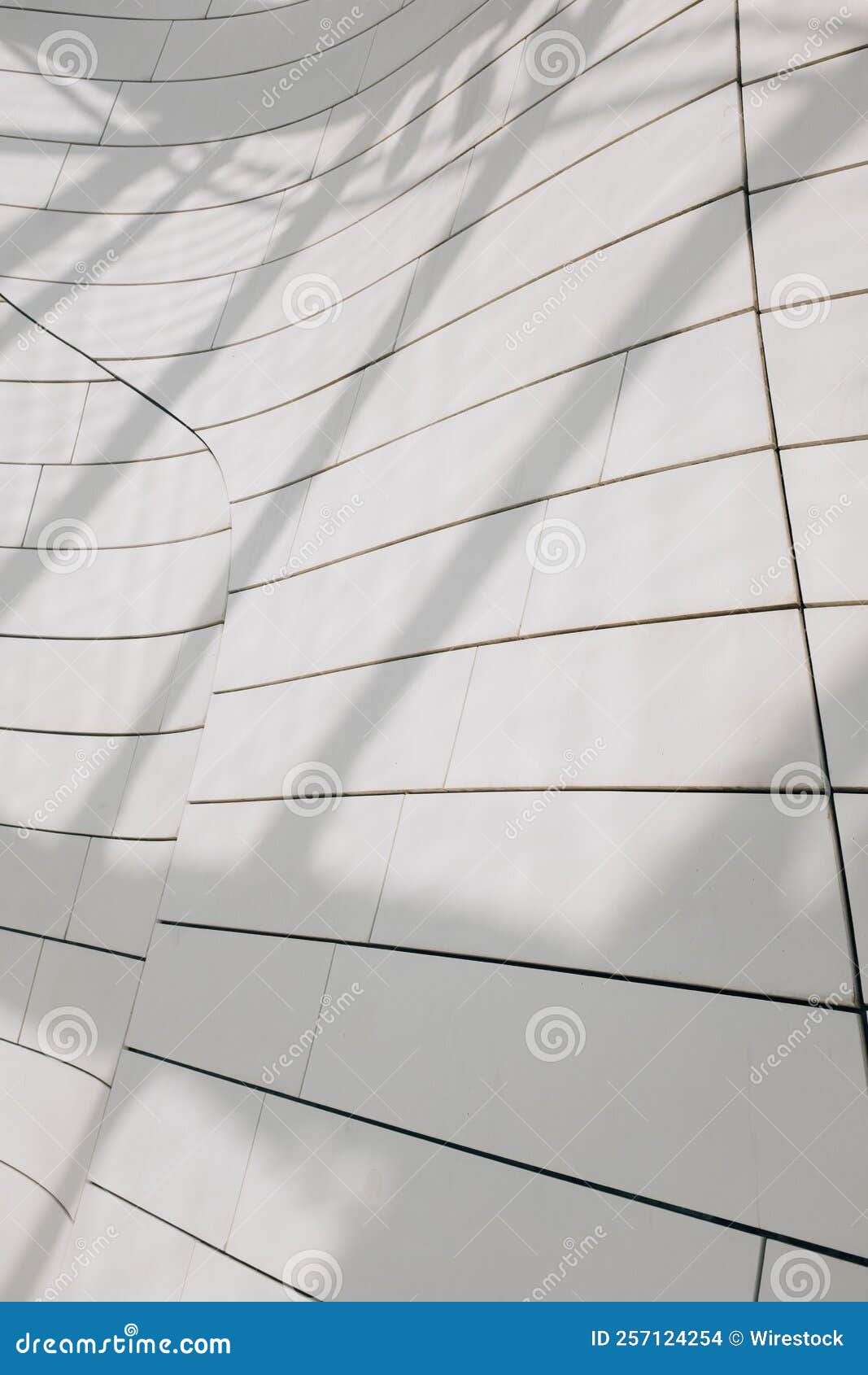 Vertical Shot of Modern White Building in Sunlight Stock Photo - Image ...