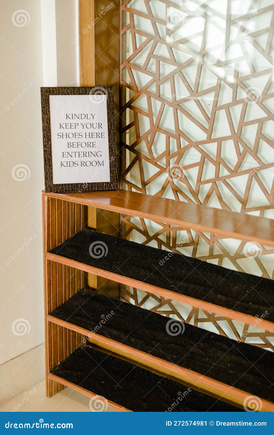 Vertical Shot of a Modern Wooden Shoe Rack Stock Image - Image of ...
