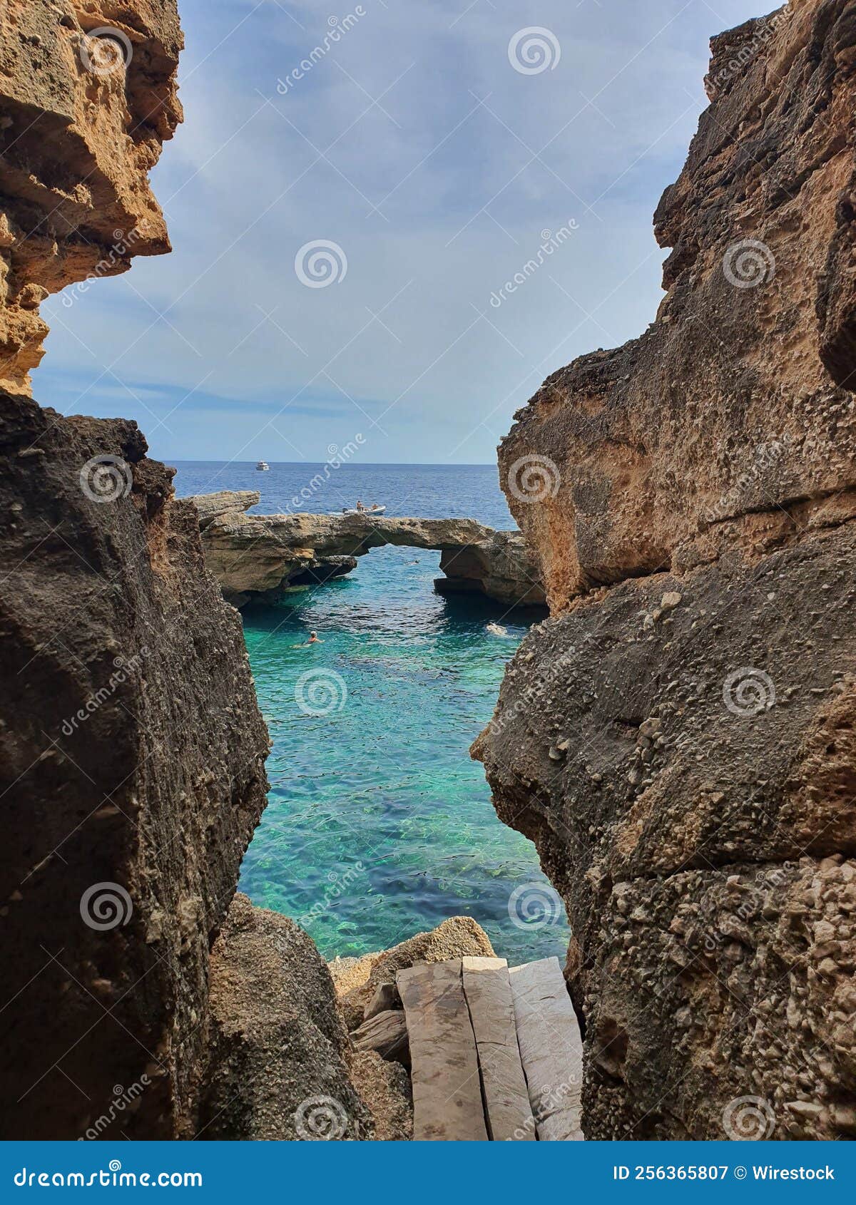Vertical Shot of the Monachus Monachus Arch through Cliffs in Cyprus ...